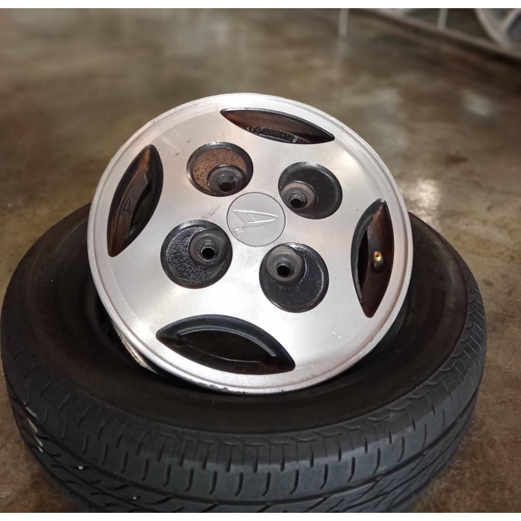 Used 12 Inch Daihatsu Mira L70 Series Rim (Black & Silver) | Shopee ...