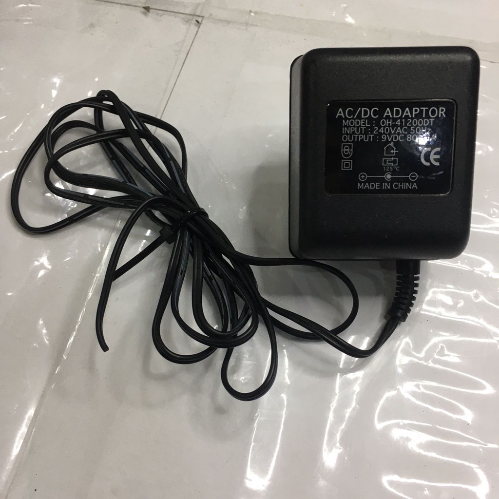 AC / DC ADAPTOR MODEL: OH-41 200 DT INPUT: 240VAC 50 HZ OUTPUT: 9VDC ...