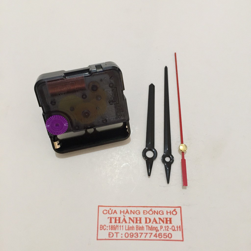 Set of 10cm long black hands and regular Taiwanese watch movement with ...