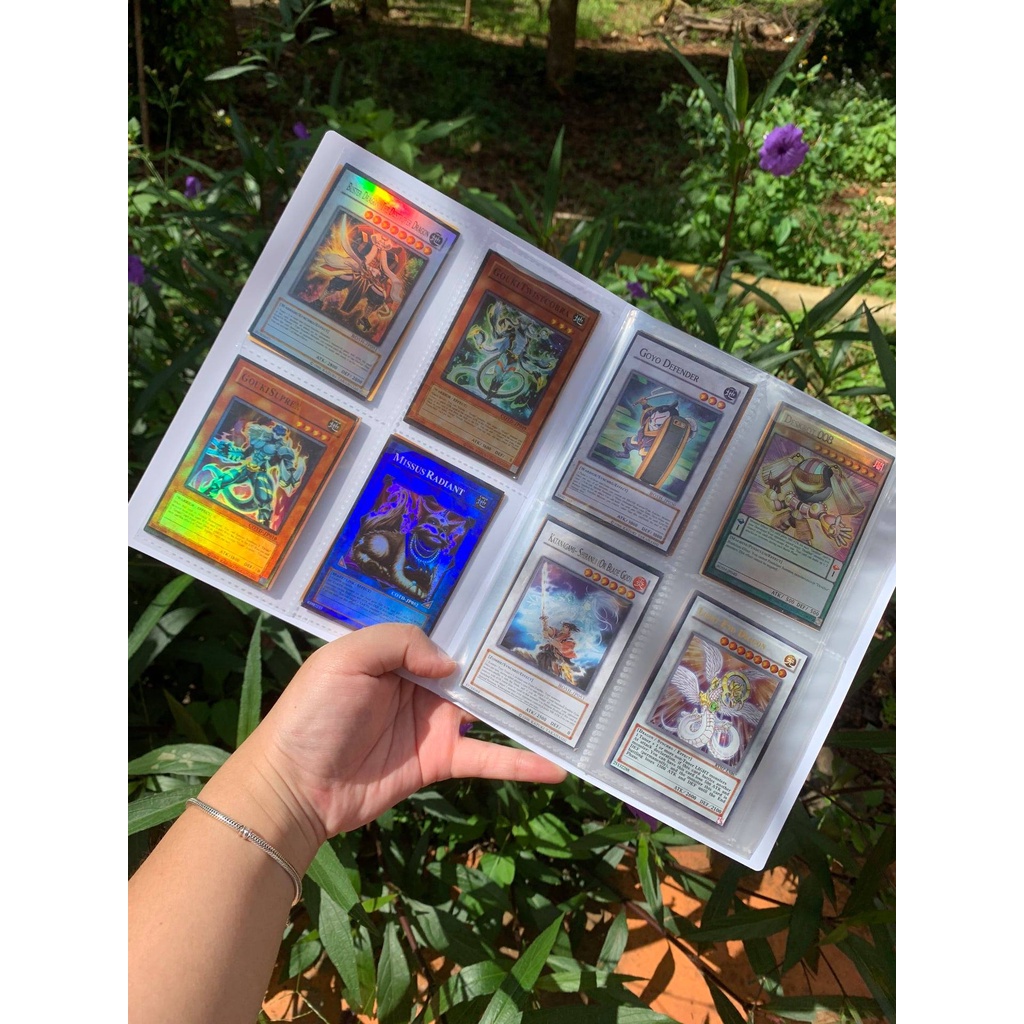 Anime Album book containing cards (cards, dignity cards,Yugioh, pokemon ...