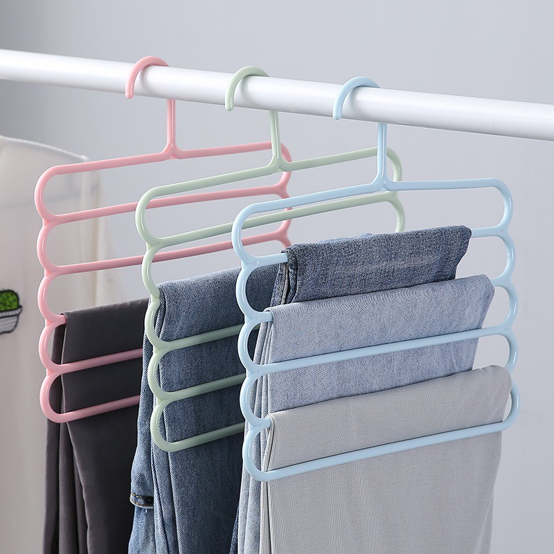 Space-saving multi-tiered plastic clothes hanger Five Tiers Laundry ...