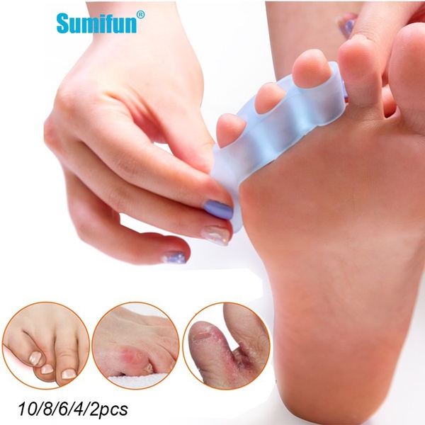Three hole small toe separation orthosis small toe overlap orthosis ...