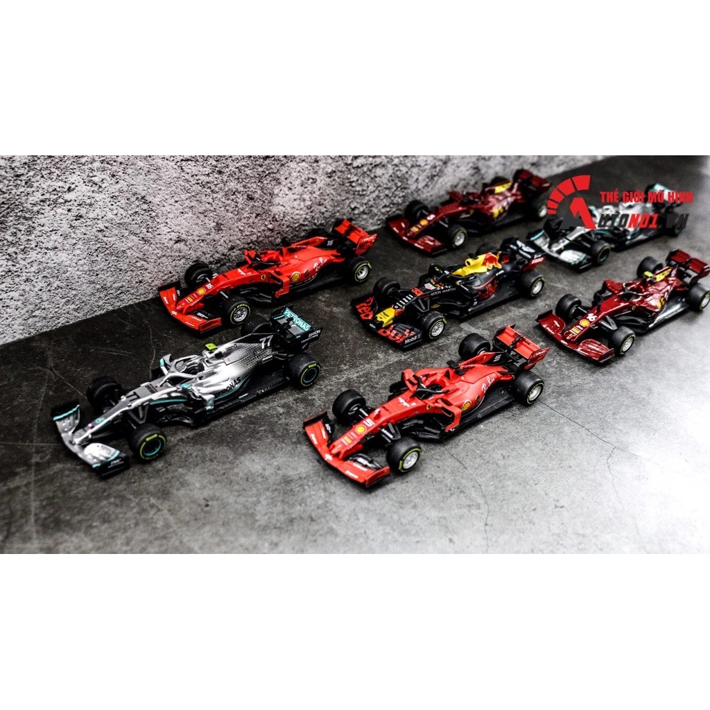 F1 Racing Car Models Of 1:43 Scales BBurago Petronas - Ferrari ...