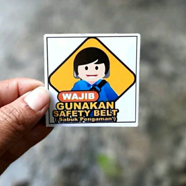 Warning sticker on the cabin of the dashboard of the passenger car. Use ...