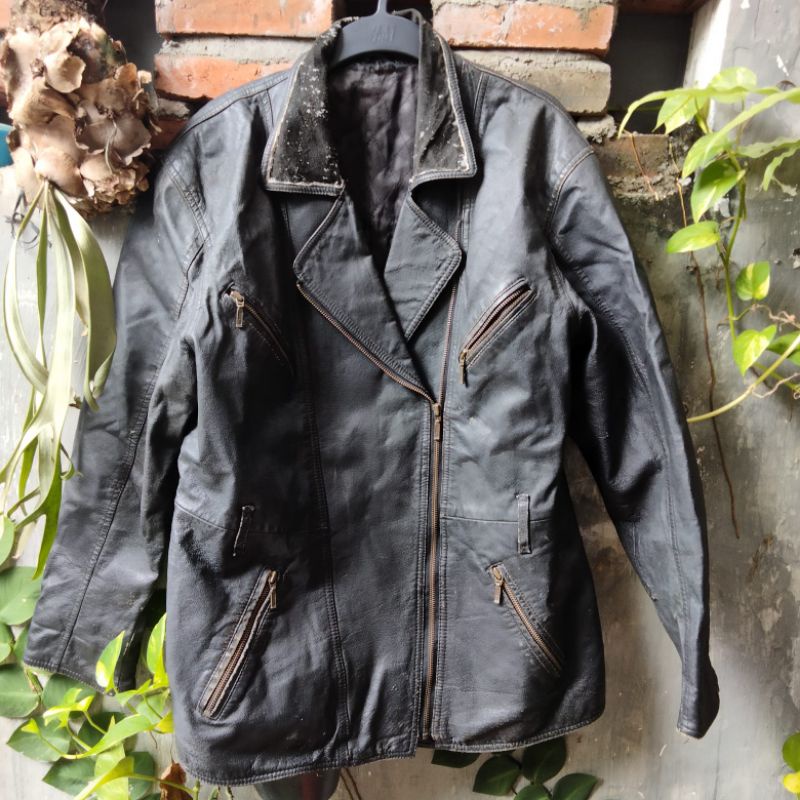 Original leather motorcycle jacket, old fashioned vintage jacket model ...