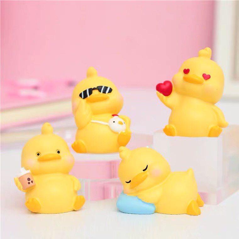 Yellow duck model with 4 super cute PVC designs as decorative gifts ...