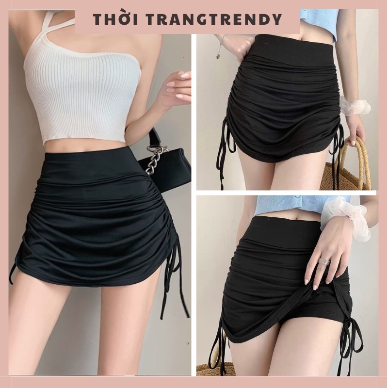 Smooth black drawstring skirt with ruffles on both sides hugs the body ...