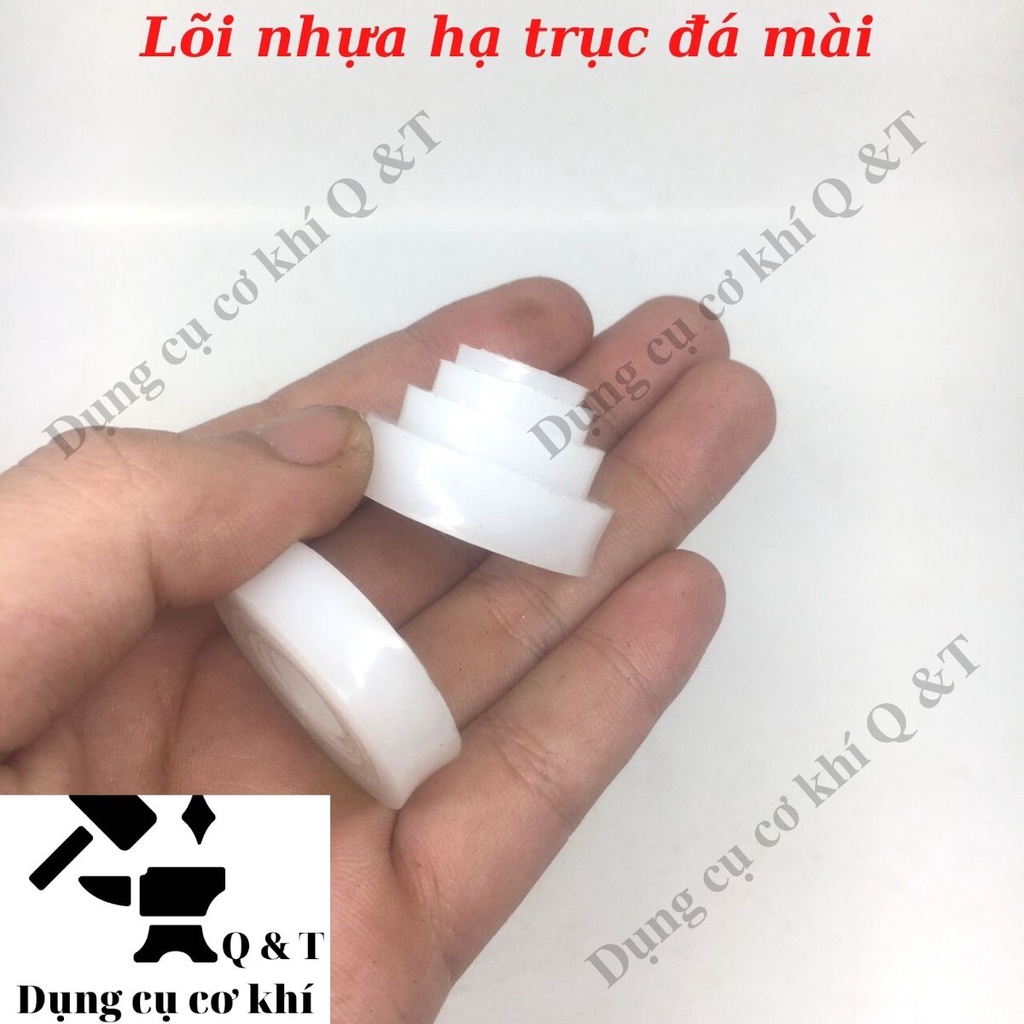 Multi-layer plastic core washer installed on stone grinder shaft, black ...