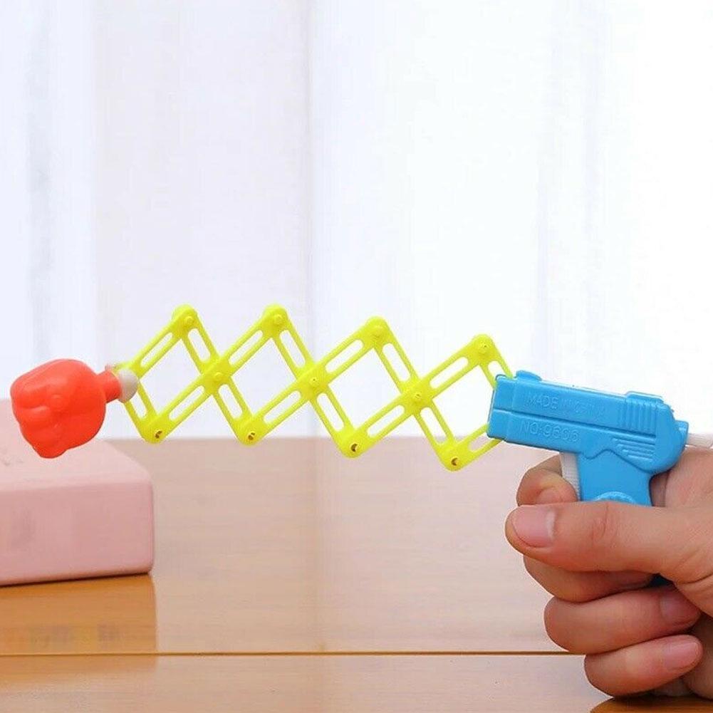 Retractable Fist Shooter Trick Toy Gun Funny Child Prank Toys Kids ...