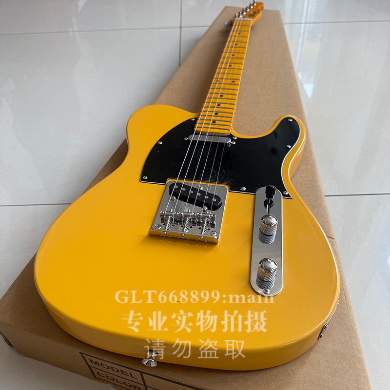 Fender Telecaster guitar, glossy yellow paint finish, professional ...