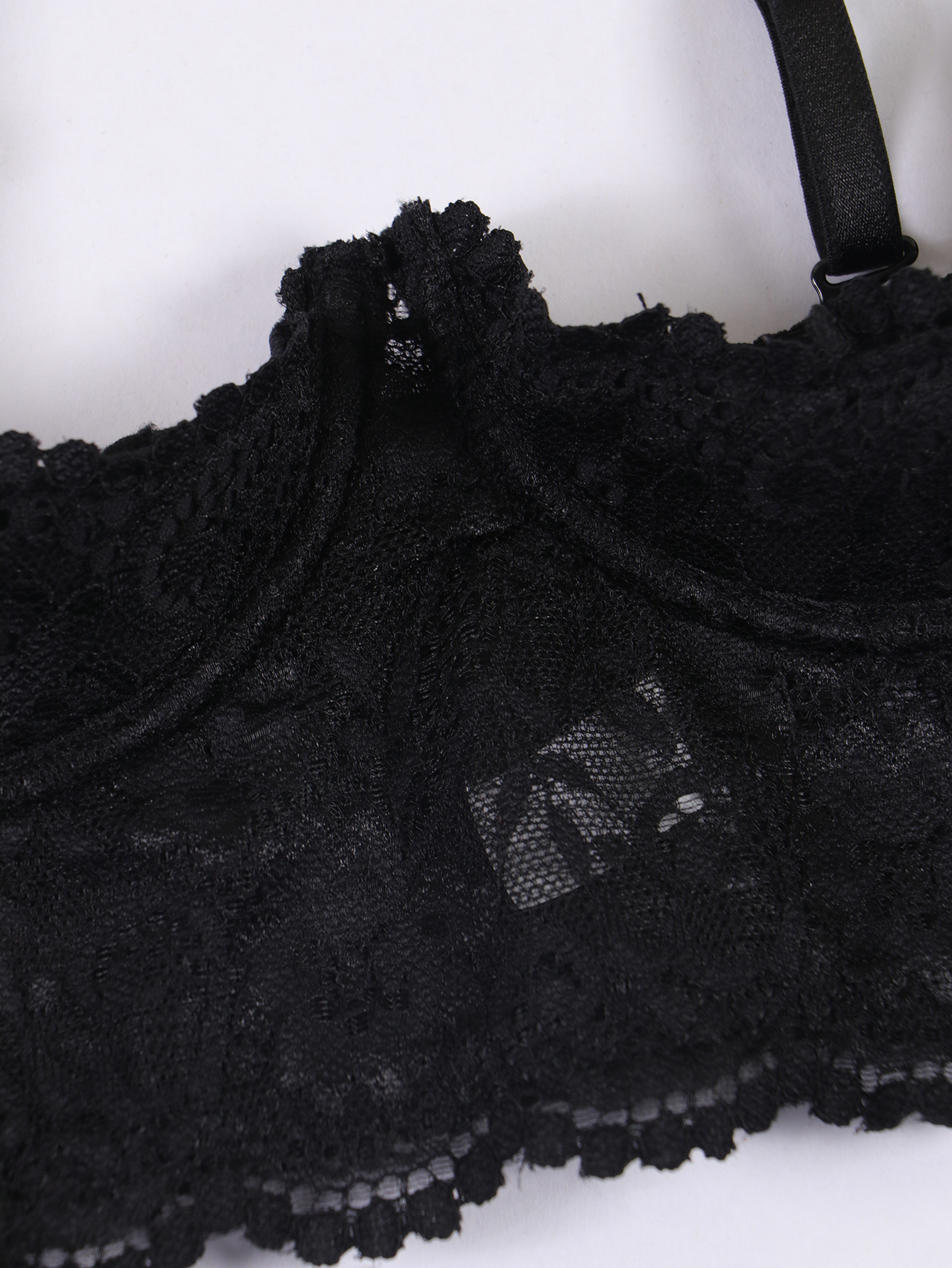 A quarter cup bra set with lace that lifts and gathers, designed to ...