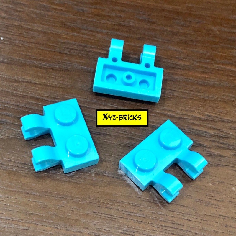 Lego PARTS 6237716 - Plate 1x2 with Vertical Holder Medium Azur ...