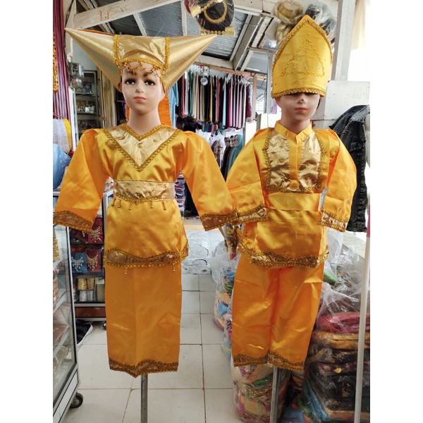 Minang Traditional Clothes For Children In padang, A Pair Of minang ...