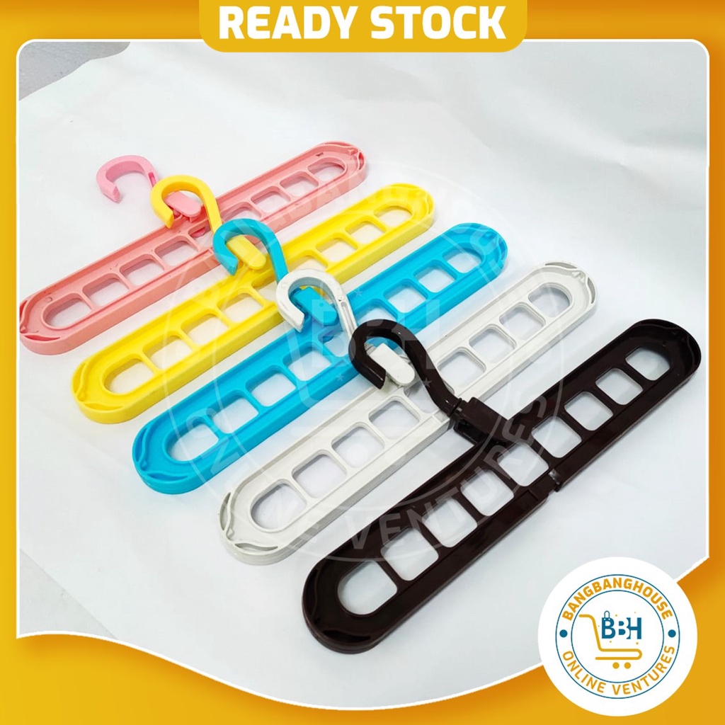 Magic Clothes Hanger Multi-function Clothes Hanger 9 hole Rotating ...