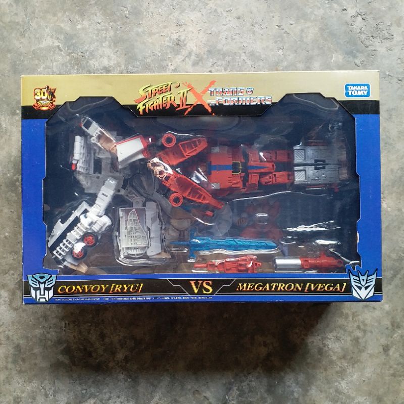Takaratomy Transformers X Street Fighter Ryu Convoy Vega Megatron MISB ...