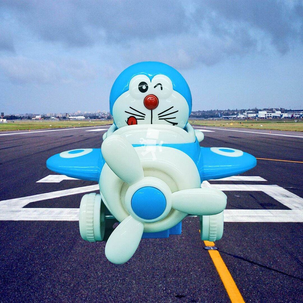 Doraemon and Hello Kitty cute aeroplane Push Pull Back Car Racing Model ...