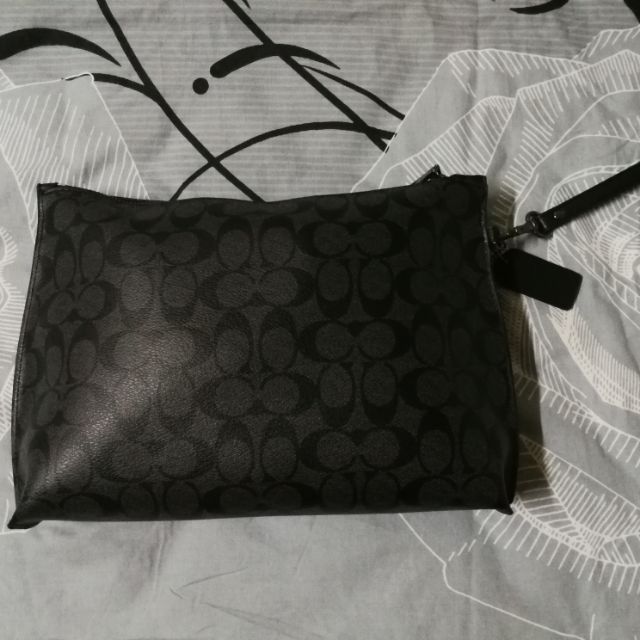 Coach Pouch in signature leather | Shopee Malaysia