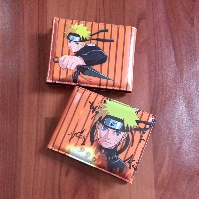Teenage boys' wallets with printed motifs of Japanese anime characters ...