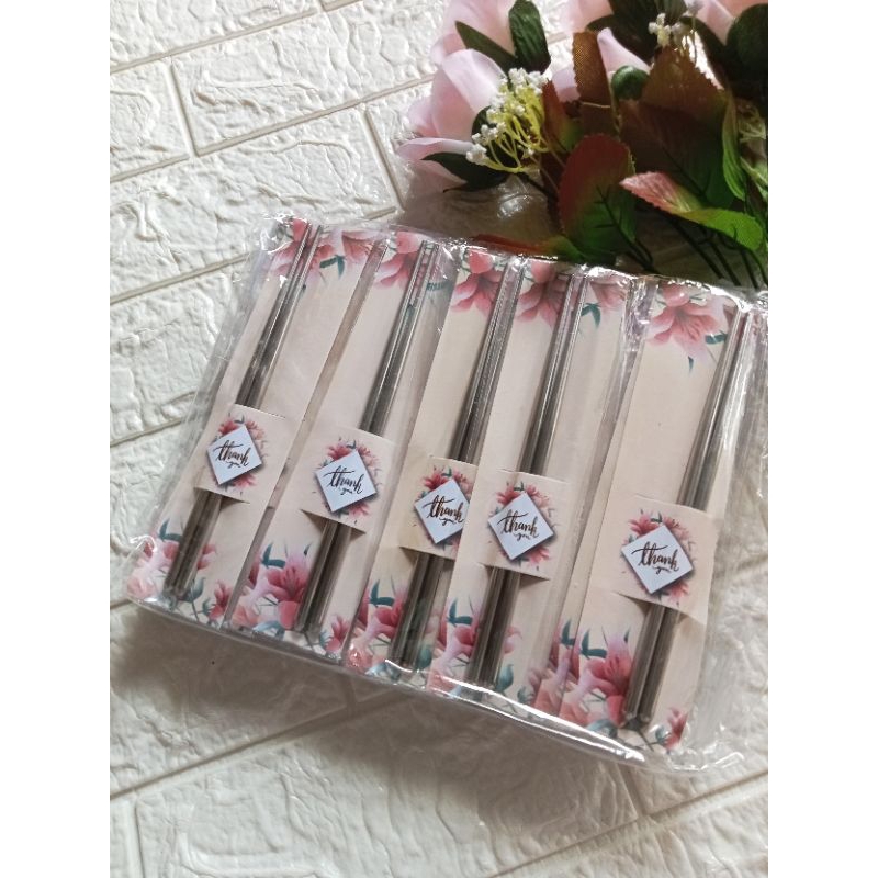 Contains 50 pcs souvenir set of stanlis chopsticks in paper packaging ...