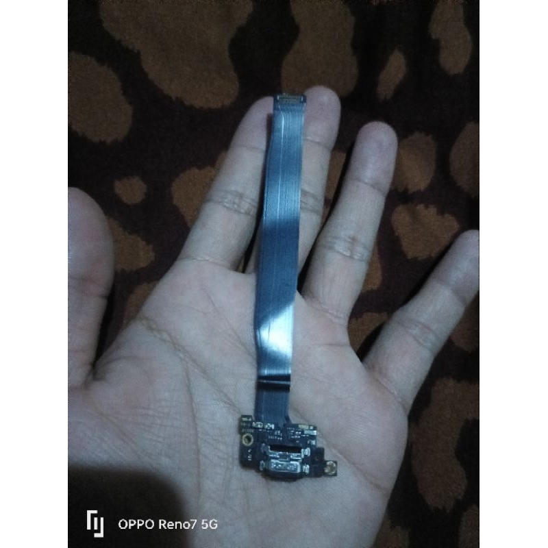 The original Poco F3 charging board was removed. The original Poco F3 ...