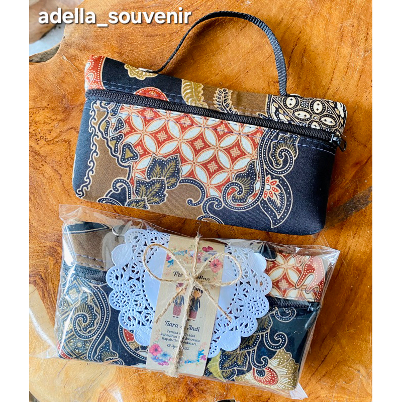 Package contains 50 pcs wedding souvenirs, mini handbag, batik pouch ...