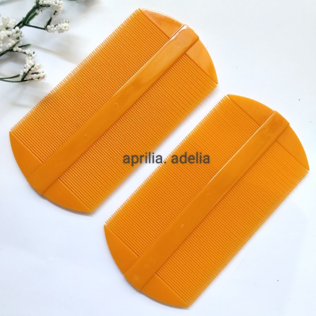 Orange-effective plastic comb removes fleas, strong, bright colors ...