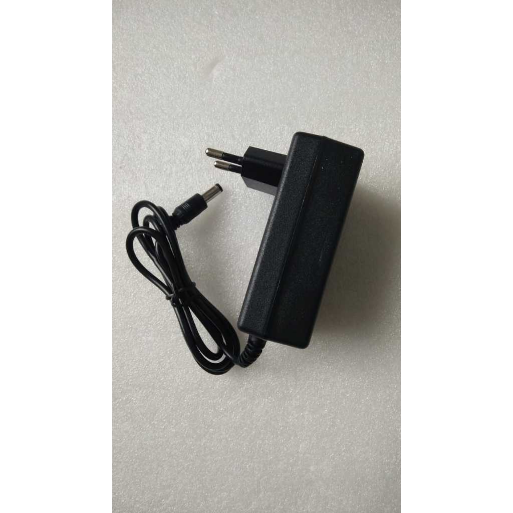 Ac/dc ADAPTER OUTPUT:12V 1000mA MODEL:HX-1210 INPUT:100-240V AC 50/60Hz ...