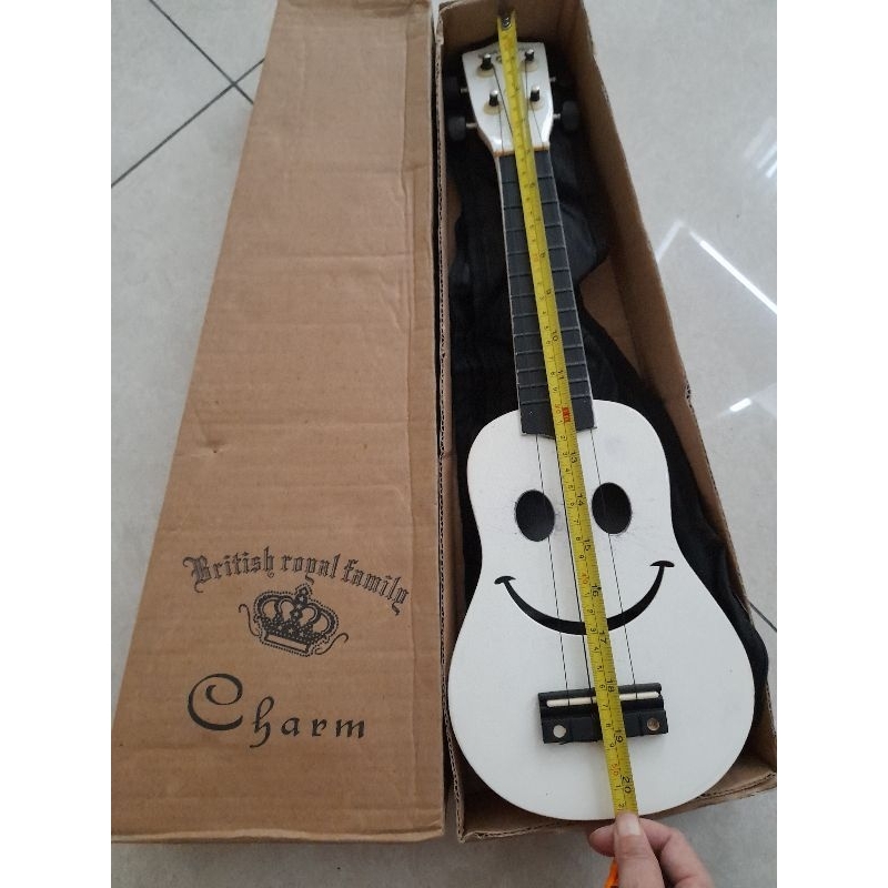 Used Ukulele- white Color , Brand British Royal Family Charm | Shopee ...