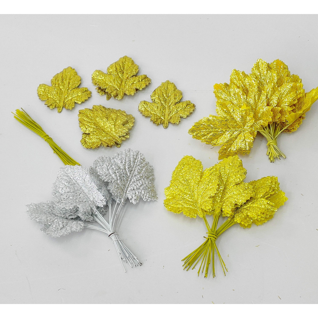 Daun - daun bentuk maple , daun paku - pakis dll untuk sanggul ...