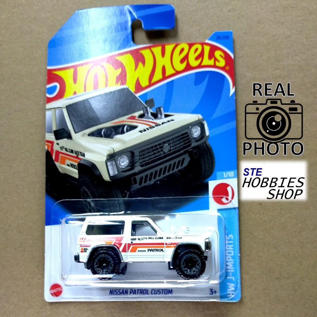 STE8 Hot Wheels "Nissan Patrol Custom" (White/ Blue/ Red)1/64 scale Car ...