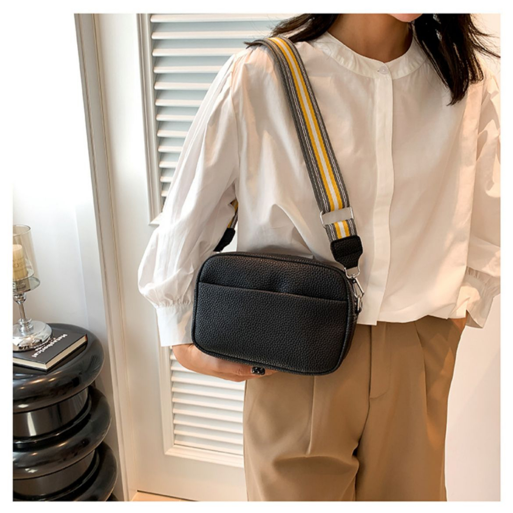 Convenient camera shape sling bag wiith easy access phone pocket ...