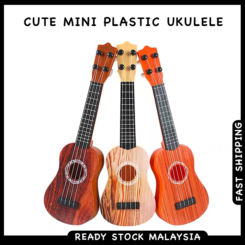 Cute Mini Plastic Ukulele Guitar Music Instrument Toy Musical Toys for ...