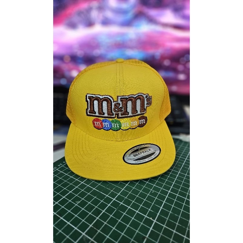 CAP M&M yellow ready stock | Shopee Malaysia