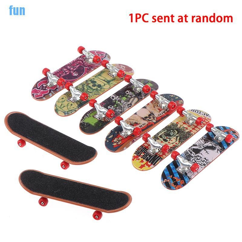 Mini Finger Skateboard Plastic Finger Skate Scooter Skateboard Boys Toy ...