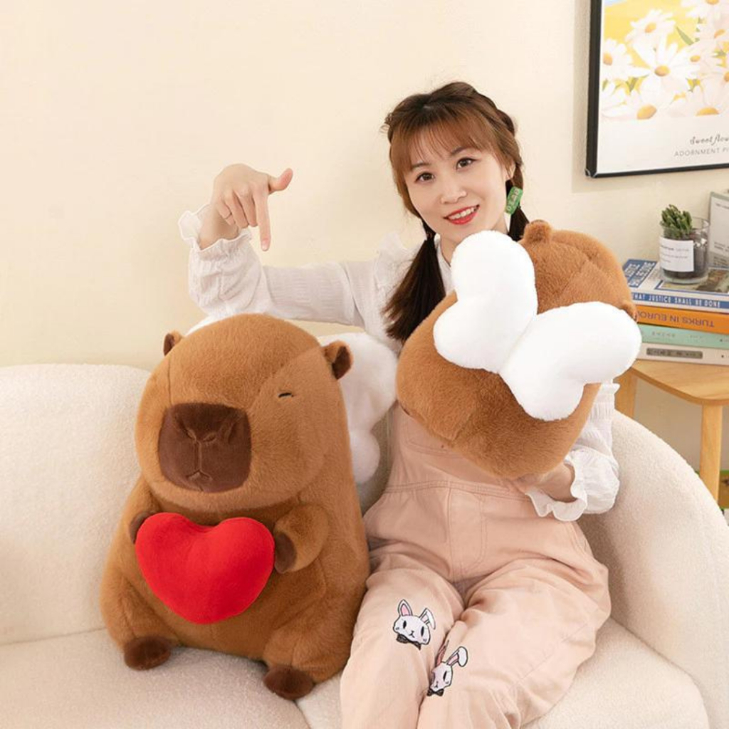 Cute Capybara plushie Angel wings holding heart capybara plush toy doll ...