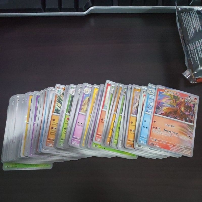 90pc damaged Pokemon cards original from surging sparks | Shopee Malaysia