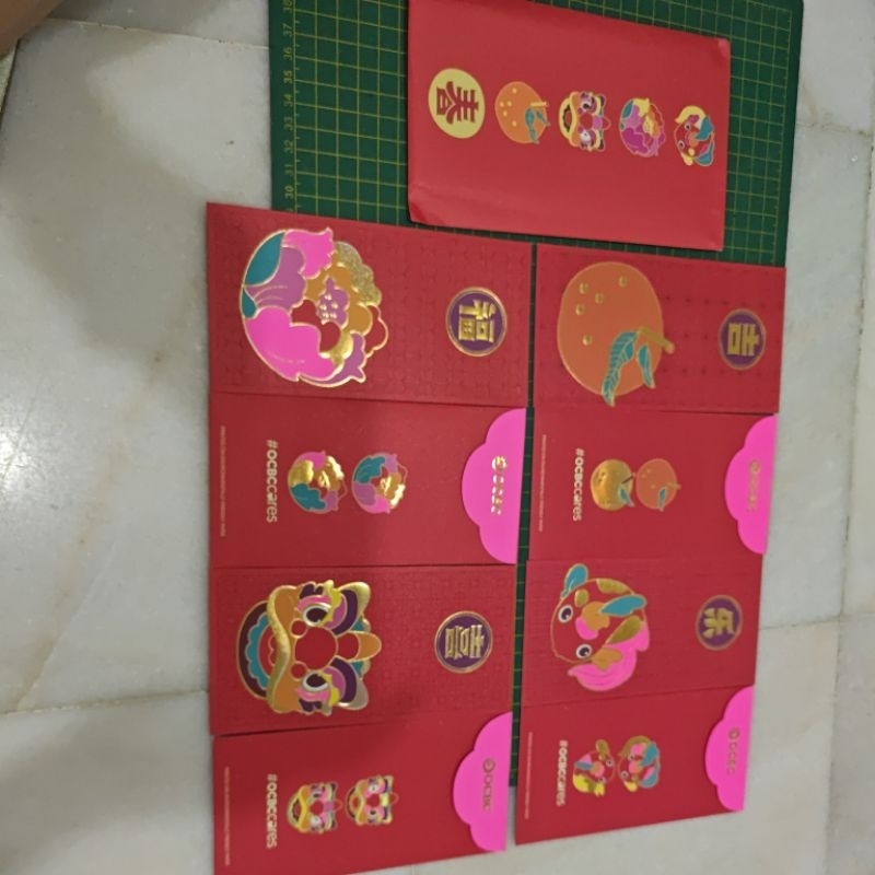 OCBC 2025 ang pow red packet 8pcs 4 design with a dented cover | Shopee ...