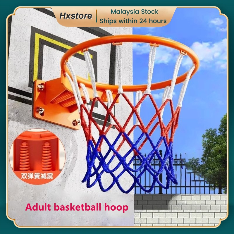A solid basketball hoop with a removable backboard, an adult-sized ...