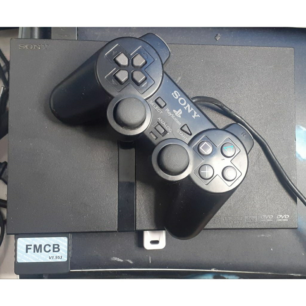 PS2 slim with free mcboot & 60 games pendrive (dvd cannot work ...