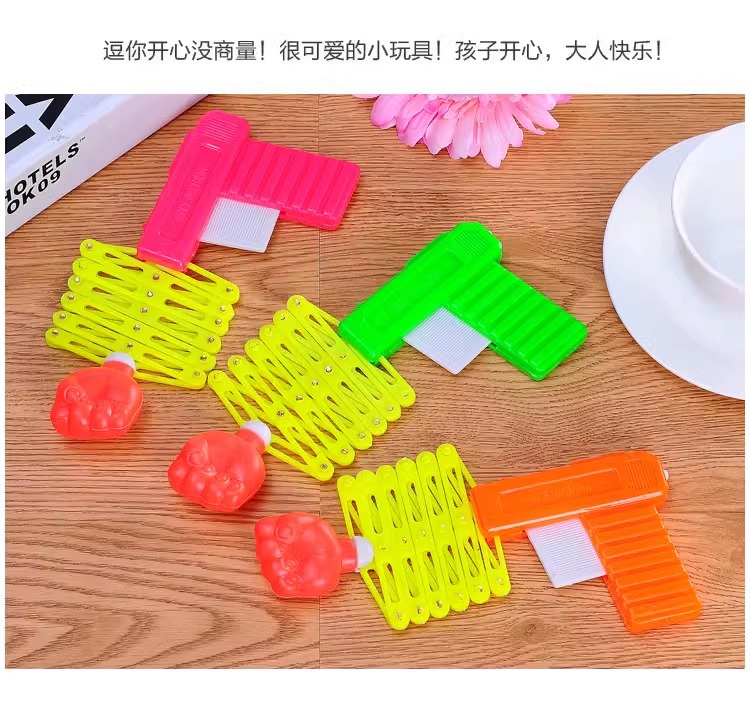 Telescopic Fist Gun Elastic Gun Plastic Material Funny Magic Gun Toy ...