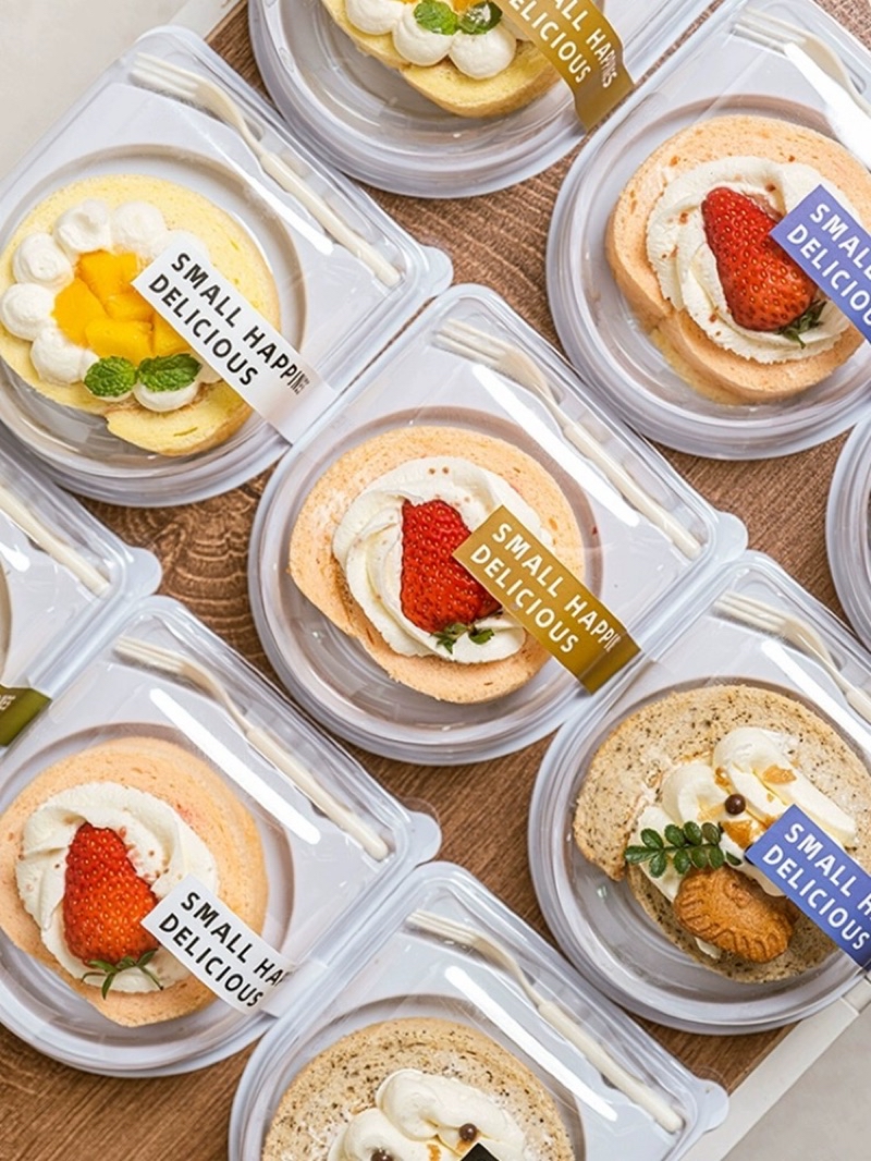 Sliced Swiss roll cake packing box with fork Half circle cake box ...