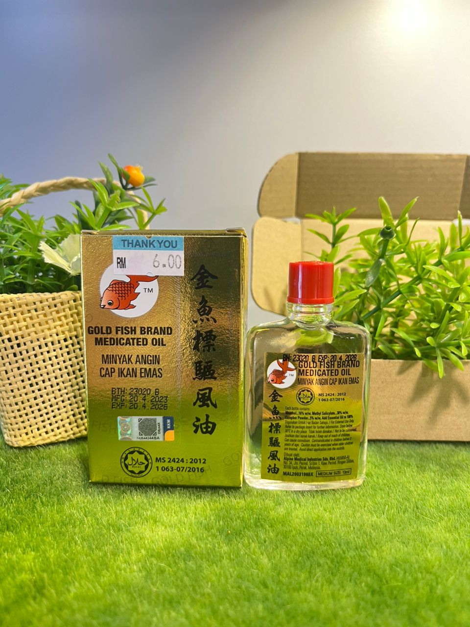 Minyak Angin Cap Ikan Emas~金魚標驅風油~Gold Fish Brand Medicated Oil ...
