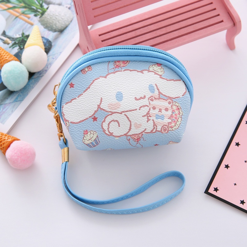 Tangan kartun memegang beg duit syiling berzip kecil perempuan kecil ...