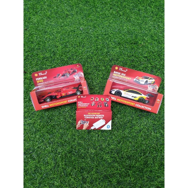 Combo with battery Ferrari SF90 and BMW M4 Shell Motorsport Collection ...