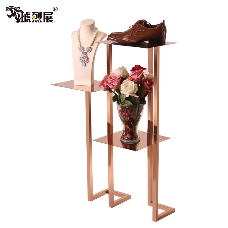 COS clothing store window display frame trapezoidal display table ...
