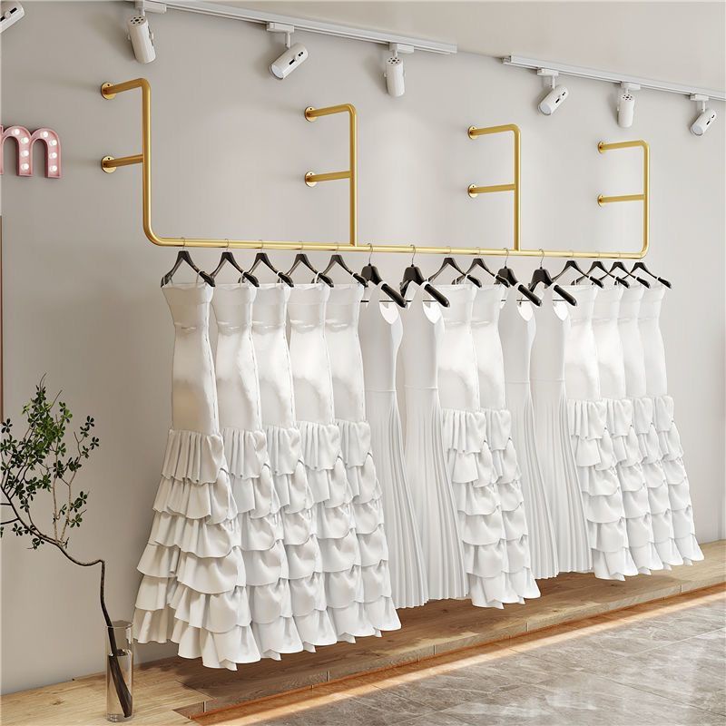 Wedding dress display rack on the wall photography building wall ...