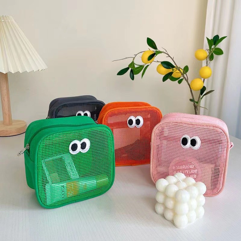 A three-dimensional mesh makeup bag, travel digital clutter sorting and ...