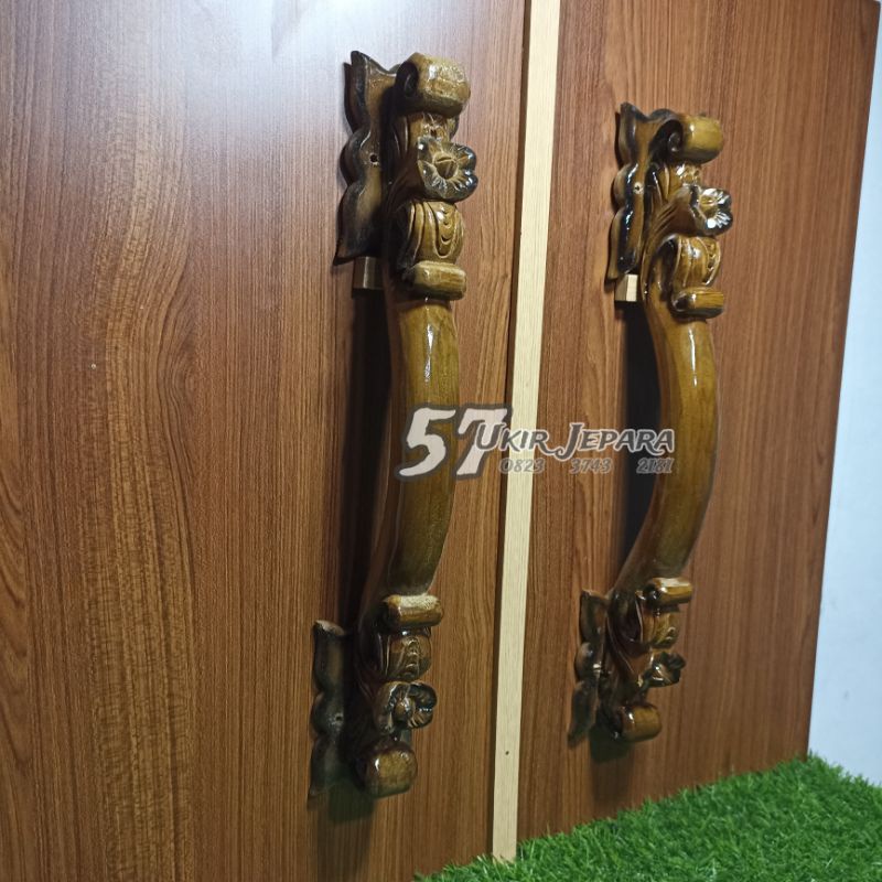 KAYU (curved 14) Long door handles with curved carved motifs made of ...