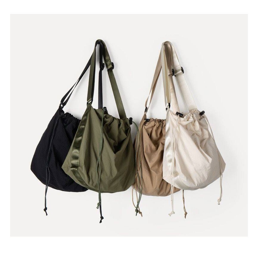 Uniqlo inspired drawstring large capacity shoulder bag | Shopee Malaysia