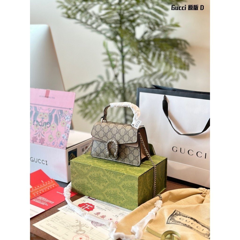 Handheld Wine God Bag Shines on Stage Kuqi Mini Wine God 24 Year New ...